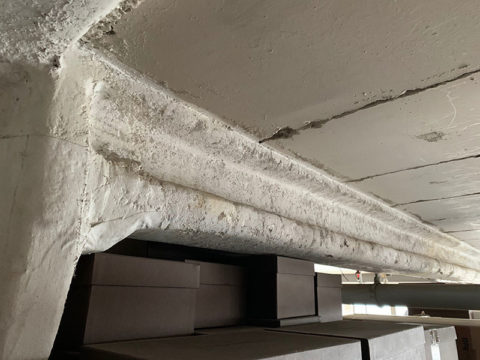 What are asbestos sprayed coatings (and what were they used for)?